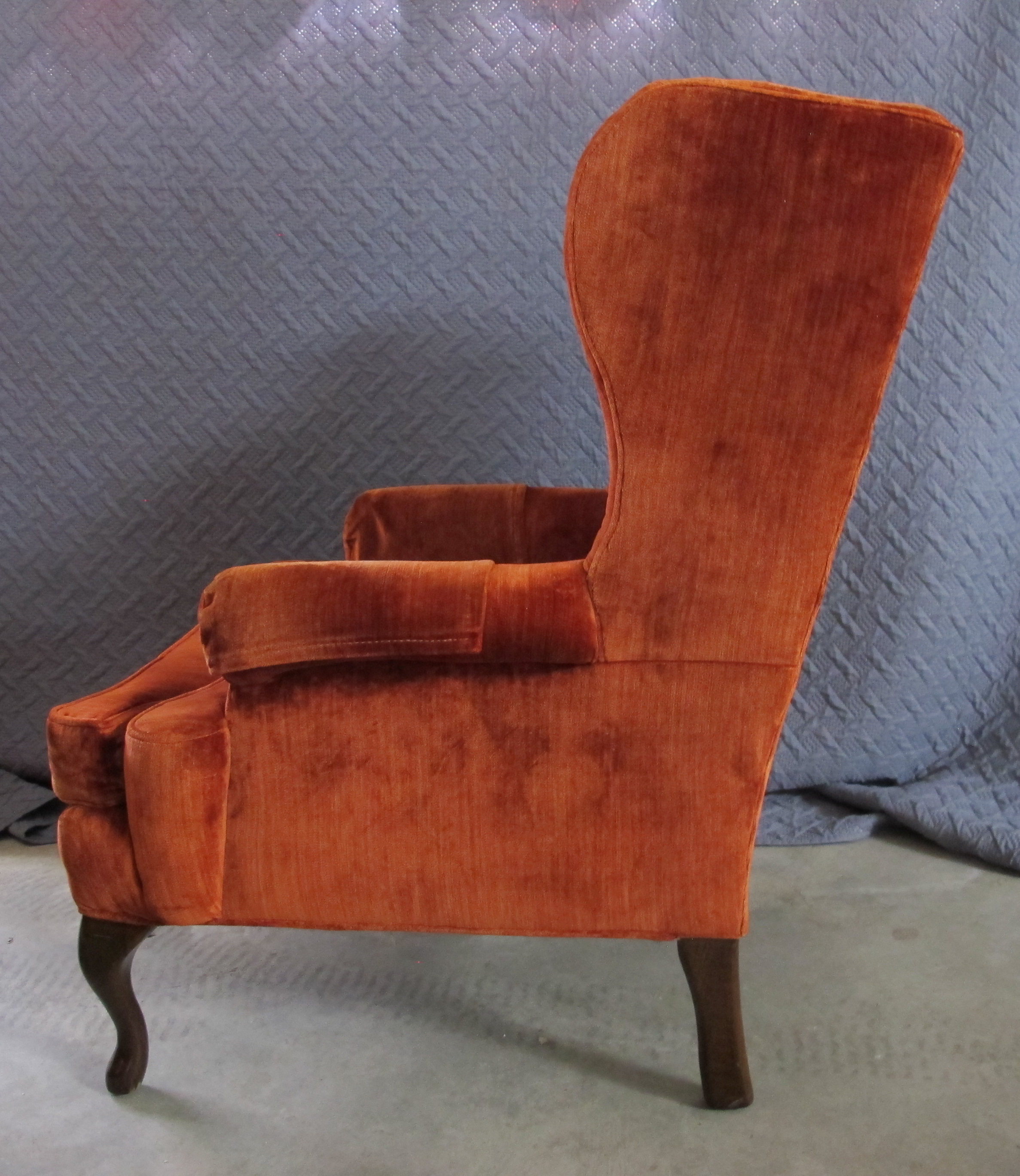 Orange velvet wingback chair store