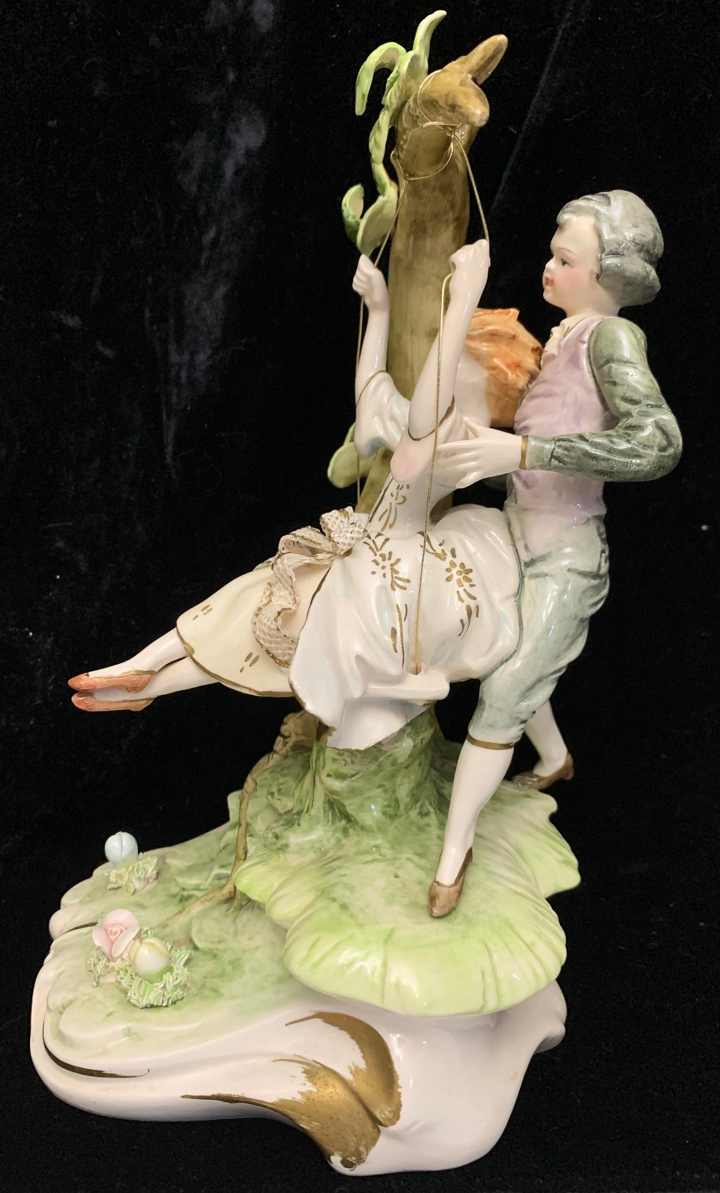 Capodimonte Boy And Girl On Swing Clipart