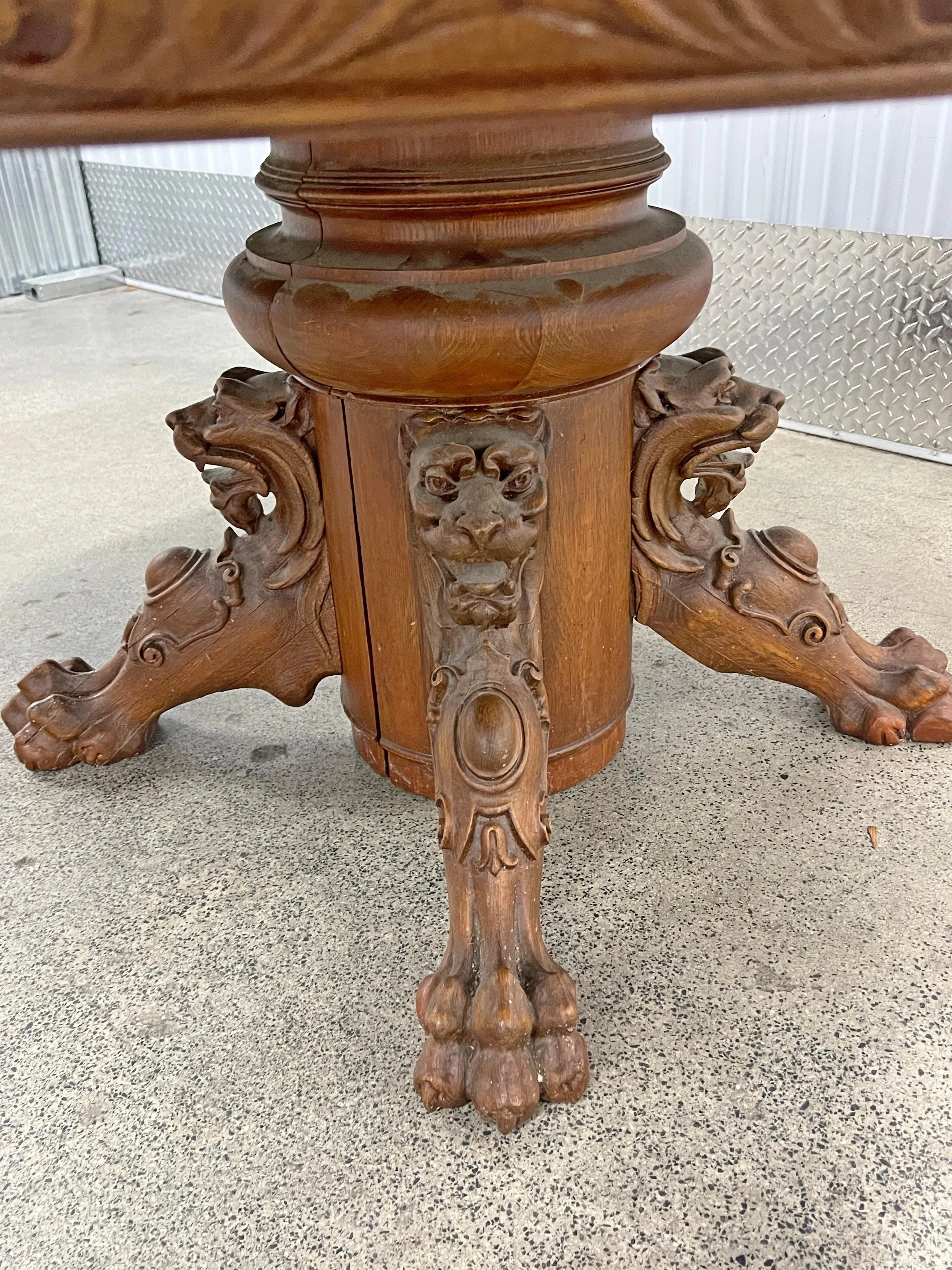 Lions claw foot table antique store