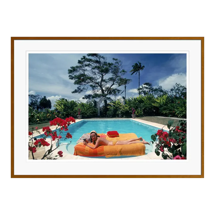 Sunbathing in Barbados 1976 by Slim Aarons Framed C-Print | Chairish