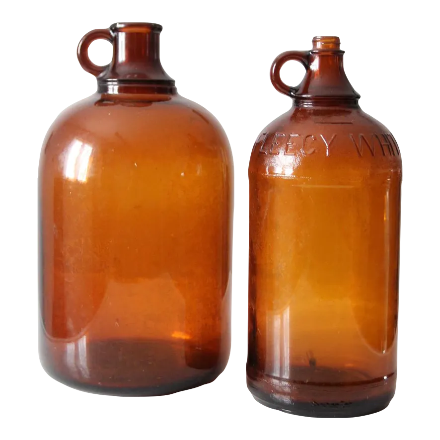 Vintage Brown Glass Bottle Jugs Pair | Chairish
