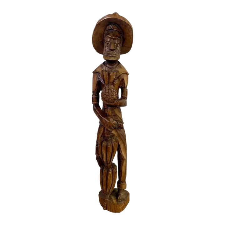 Folk Art Wood Sculpture of a Caribbean Man Holding a Pineapple | Chairish