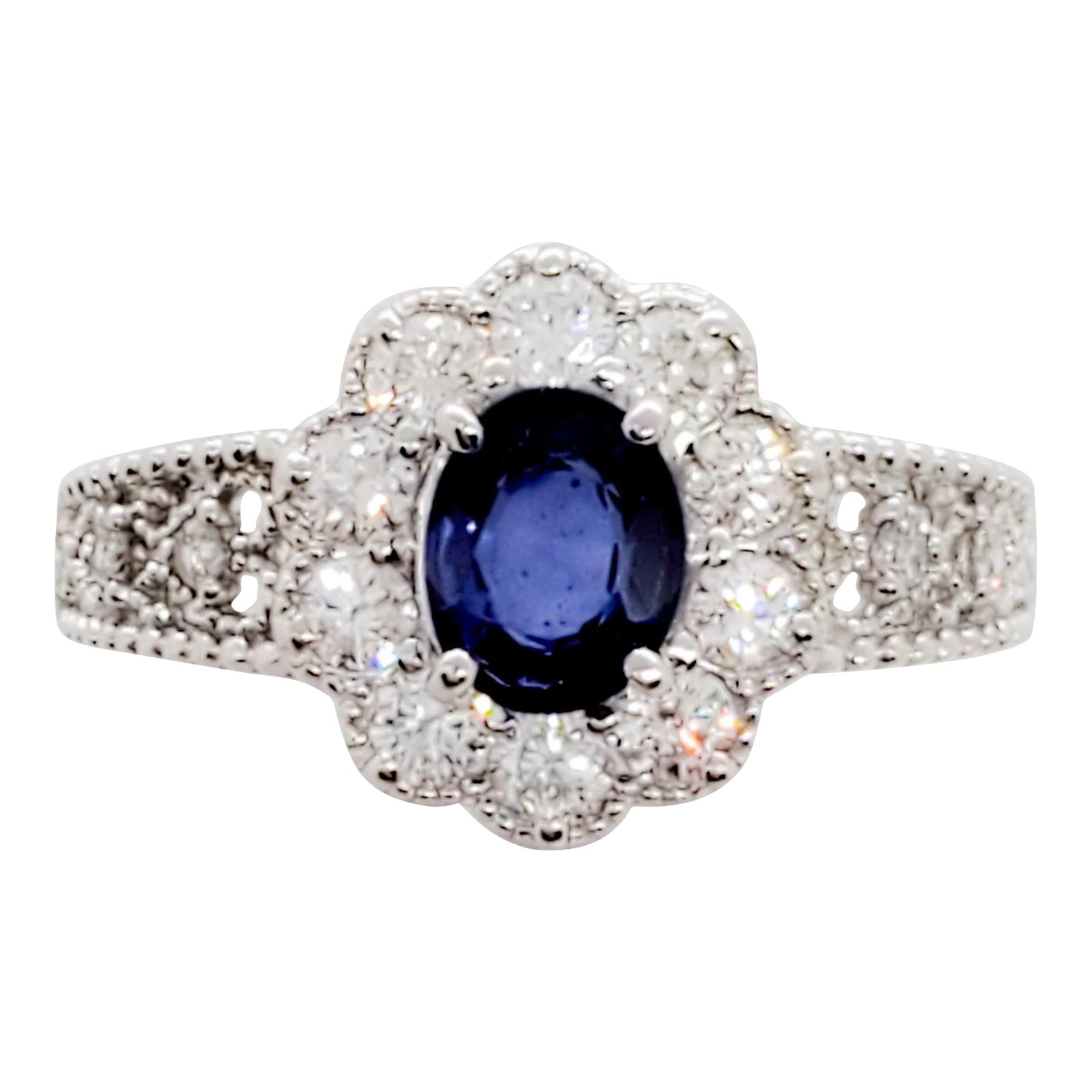 Blue Sapphire Oval and White Diamond Cocktail Ring in Platinum, size 5. ...