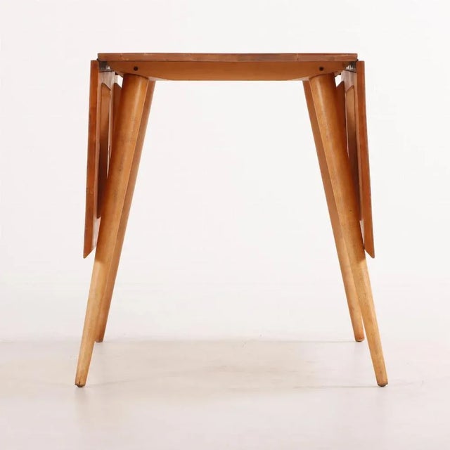 A Paul McCobb (American, 1917-1969), Maple Drop Leaf Dining Table Circa ...