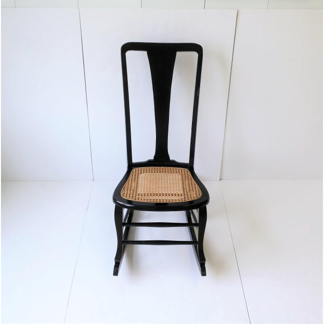 Vintage Mid Century Black Lacquer and Cane Rocking Chair | Chairish