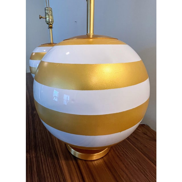 Contemporary Kate Spade New York Round Gold and White Striped Lamps - A ...