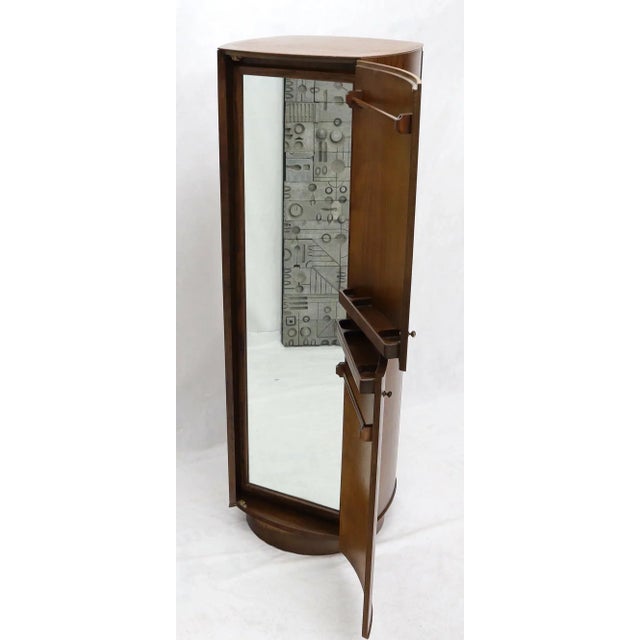 Rotating dresser with mirror store