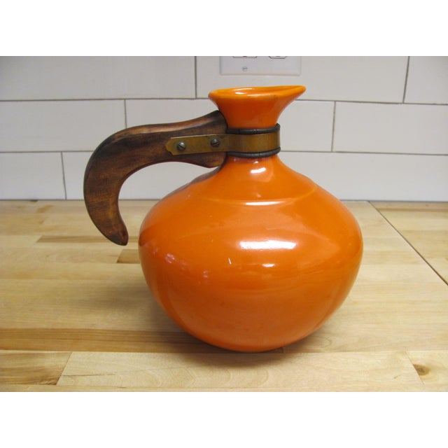 Vintage Bauer Wood Handle Pitcher in an Orange Glaze | Chairish