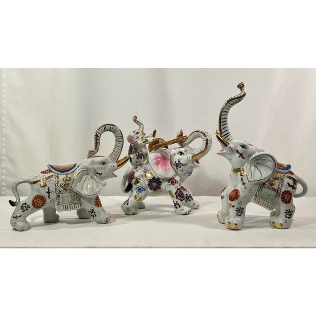 Vintage Chinoiserie White Elephants Figurines With Trunks Up - Set of Three | Chairish