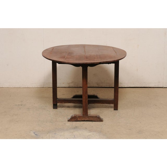 Early 20th Century Antique French Vintner's Table, Oval-Shaped | Chairish