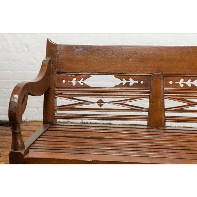 Dutch Colonial Bench with Carved Back, Scrolling Arms and Turned ...