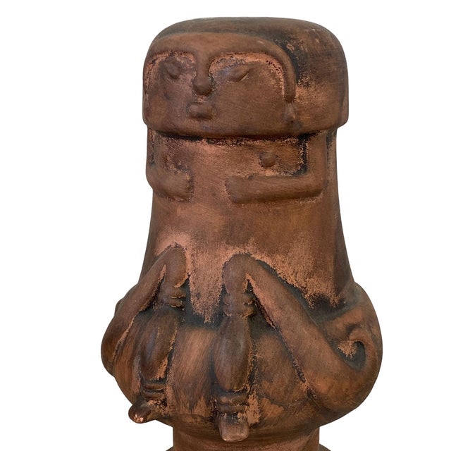 Red Clay of a Seated Figure on Vessel | Chairish