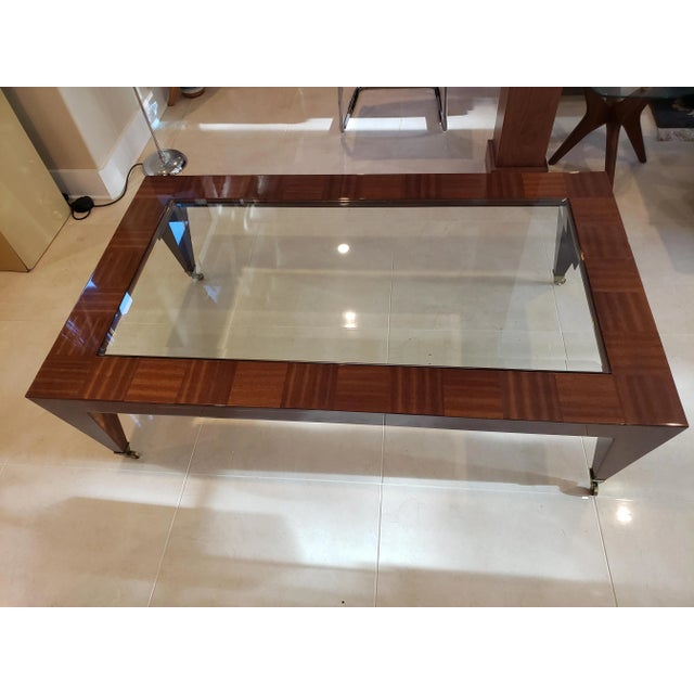 1980s Glass Inlaid in Wood Coffee Table With Brass Roller Feet | Chairish