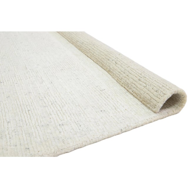 Apadana's Modern Moroccan Style Wool Rug in Ivory Features a Minimalist ...