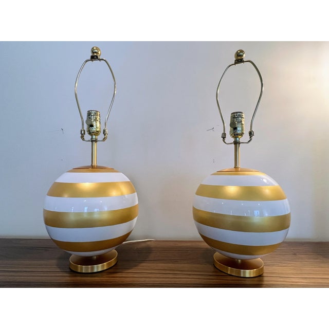 Contemporary Kate Spade New York Round Gold and White Striped Lamps - A ...