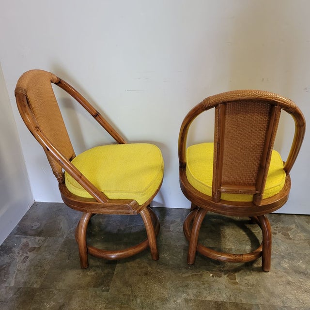 Four Rattan Swivel Chairs With Yellow Upholstery With Matching Table ...