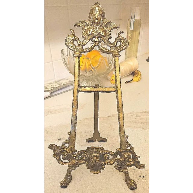 Vintage Ornate Brass Easel Stand With Molded Brass Faces | Chairish