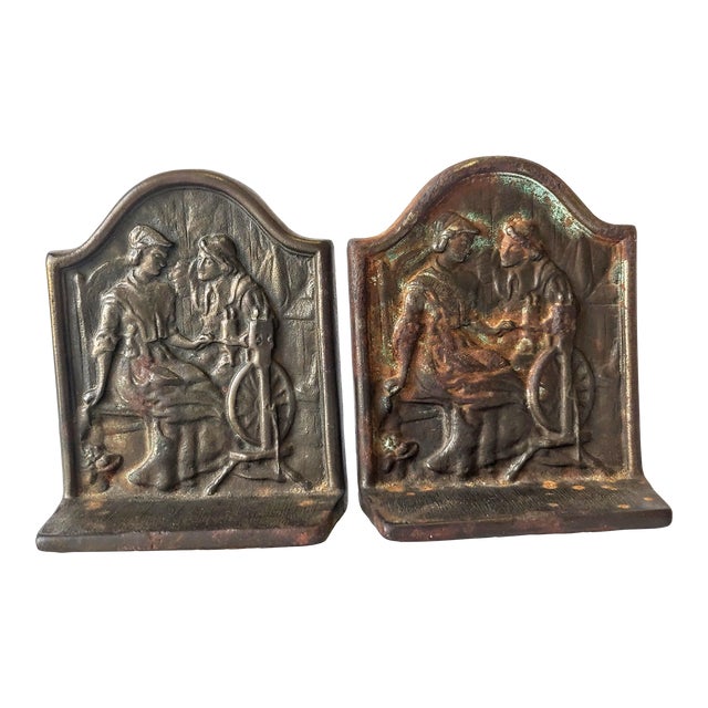 Vintage 1928Alden and Priscilla Cast Iron Bookend | Chairish