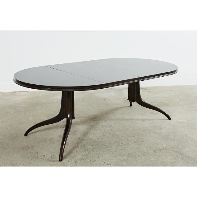 t.h. Robsjohn-Gibbings for Widdicomb Round Extending Dining Table ...