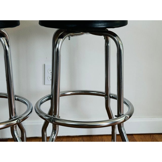Vintage 1970s Black Vinyl Swivel Bar Stools, a Pair | Chairish