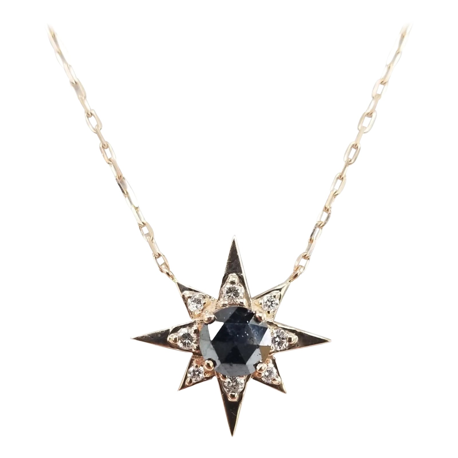 14 Karat Rose Gold Diamond Star Burst with Black and White Diamonds ...