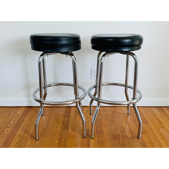 Vintage 1970s Black Vinyl Swivel Bar Stools, a Pair | Chairish