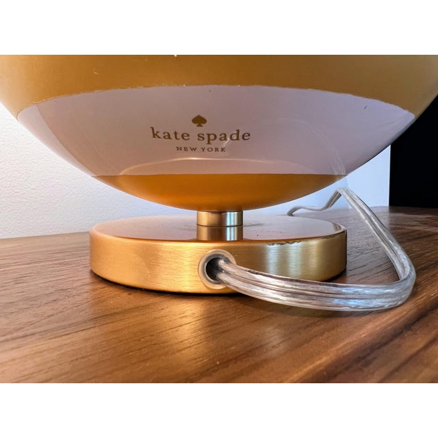 Contemporary Kate Spade New York Round Gold and White Striped Lamps - A ...