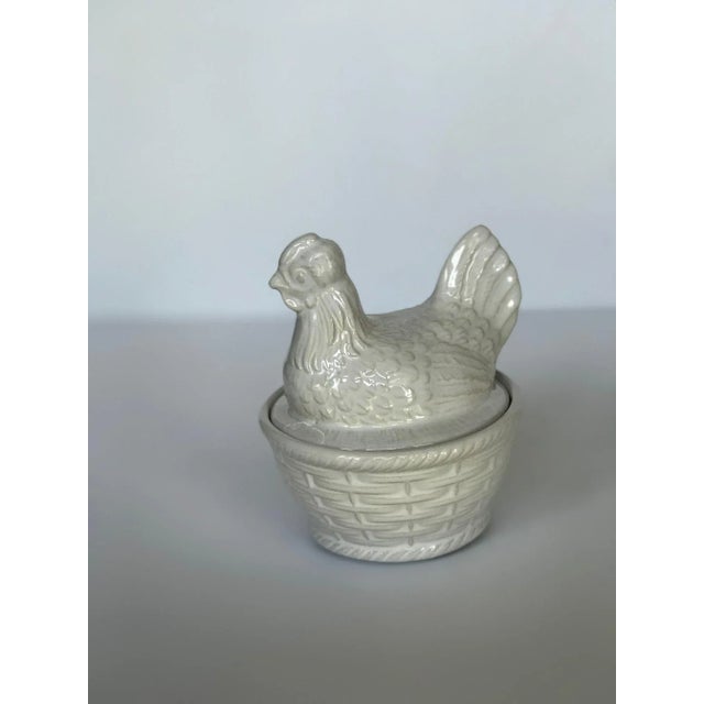 White Ceramic Hen Sitting on a Basket Dish Made in Portugal | Chairish