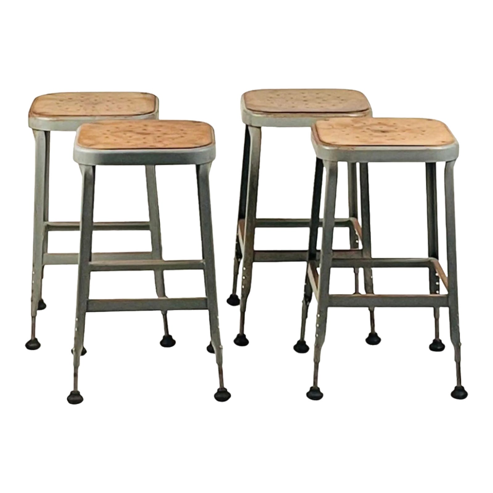 Set of 4 Adjustable Patinated Steel Counter Stools by Lyon ...