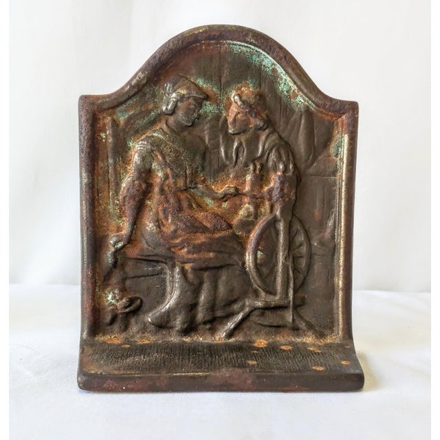 Vintage 1928Alden and Priscilla Cast Iron Bookend | Chairish