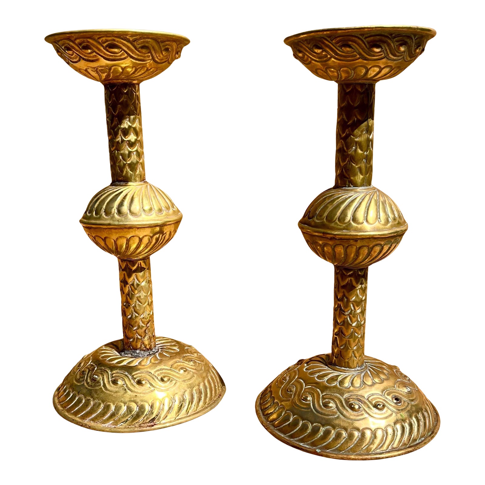 Large Pair of English Renaissance Repousse Brass Candlesticks. | Chairish