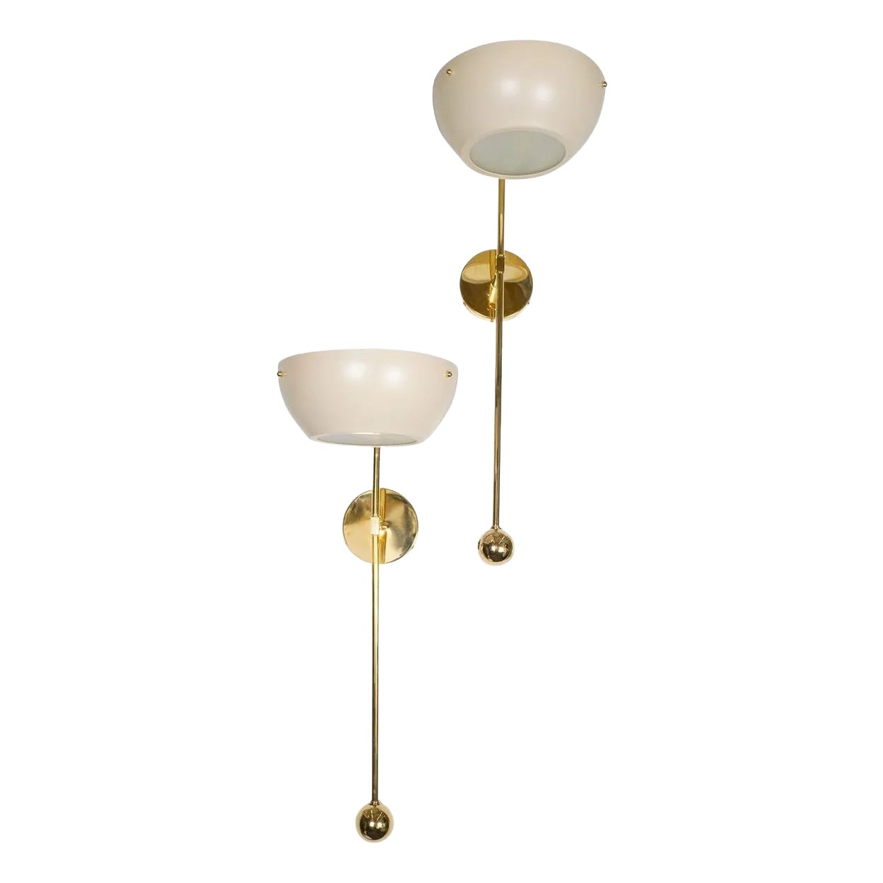 Pair of modern single-arm torch style sconces | Chairish