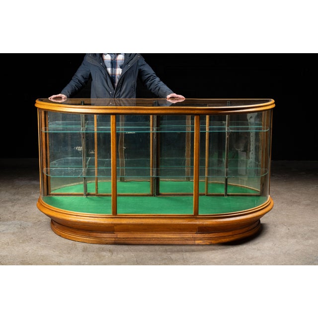 C. 1910 Oak and Curved Glass Display Case | Chairish