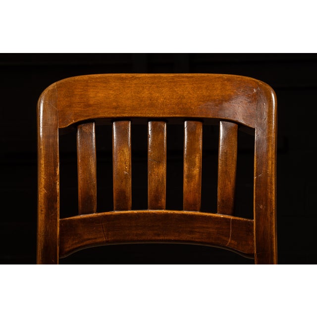 Early 20th Century Antique Wooden Rolling Banker's Chair | Chairish