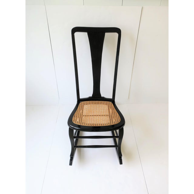 Vintage Mid Century Black Lacquer and Cane Rocking Chair | Chairish