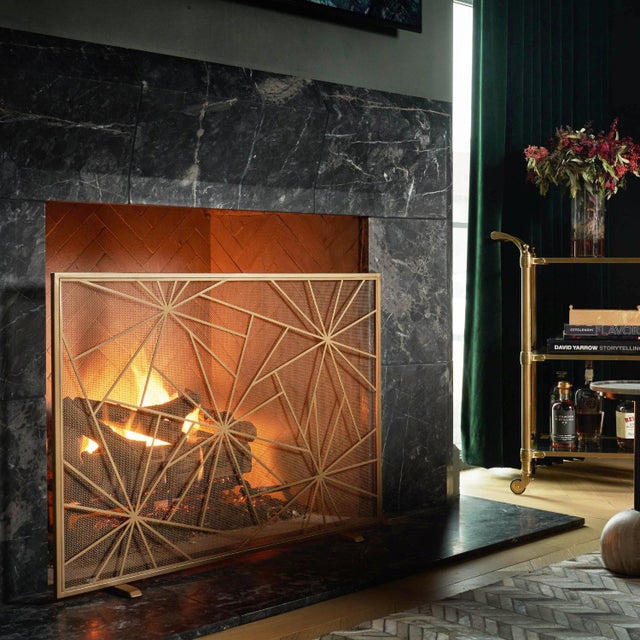 Early 21st Century Iron Shattered Starburst Fire Screen | Chairish
