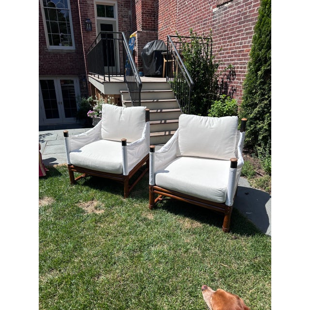 Pair of White Slipcovered Sling Arm Chairs | Chairish