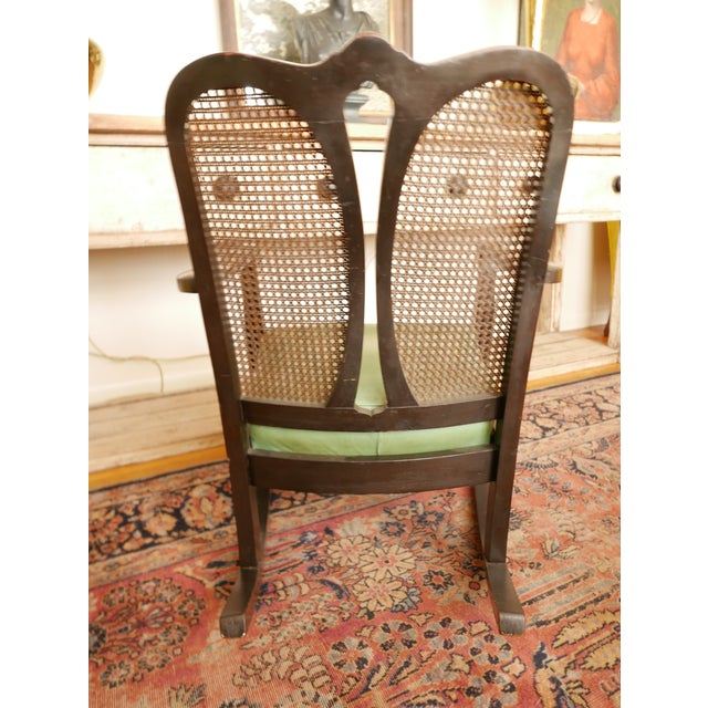 Antique Black Cane Back Rocker | Chairish