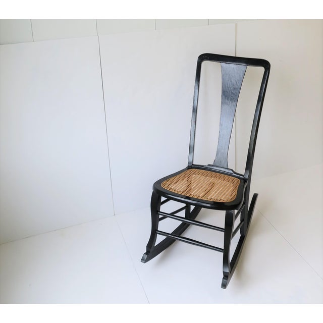 Vintage Mid Century Black Lacquer and Cane Rocking Chair | Chairish