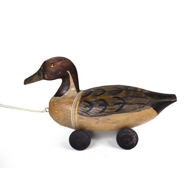 Vintage Wood Carved Painted Duck on Wheels Pull Toy | Chairish