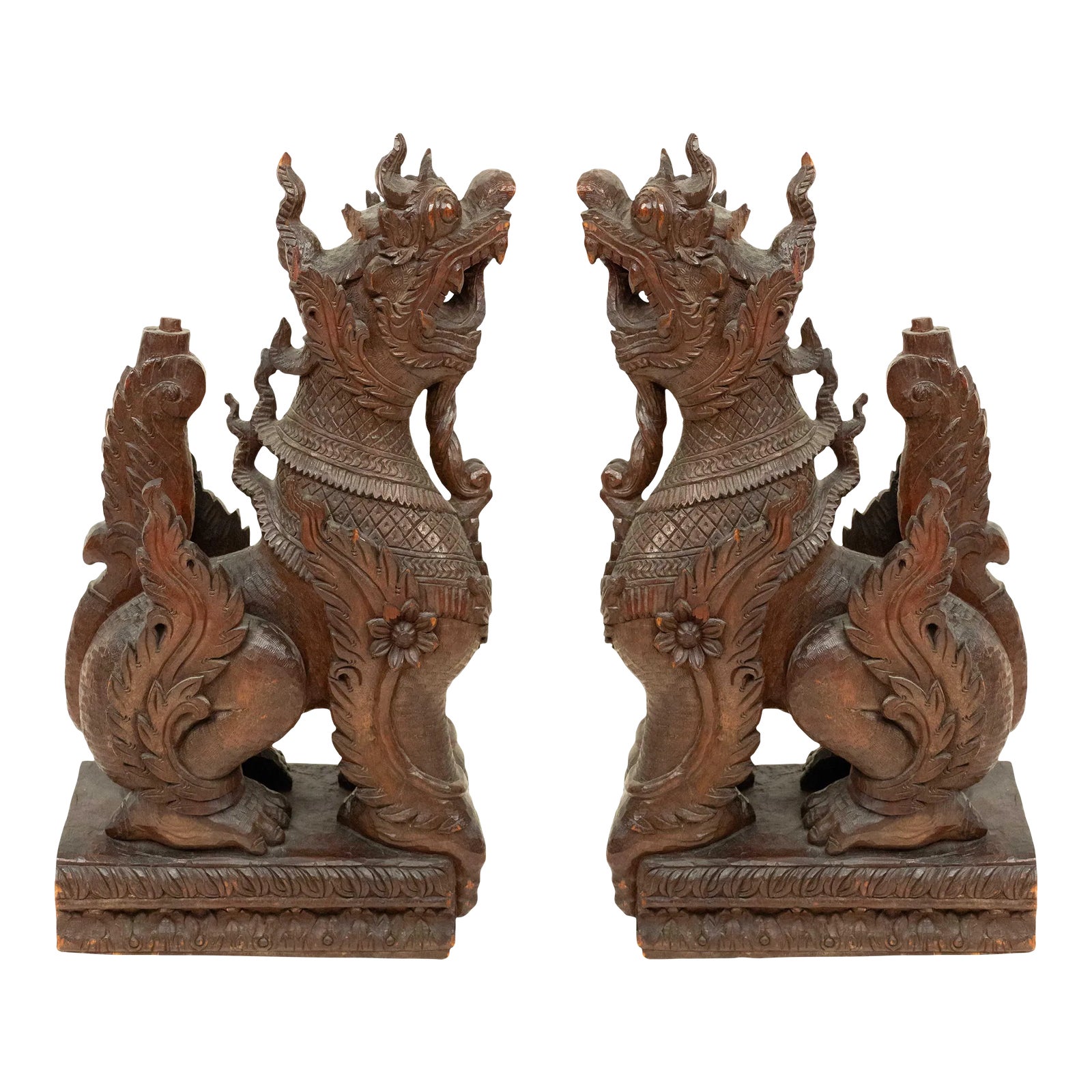 Burmese Carved Foo Dog Figures - A Pair | Chairish
