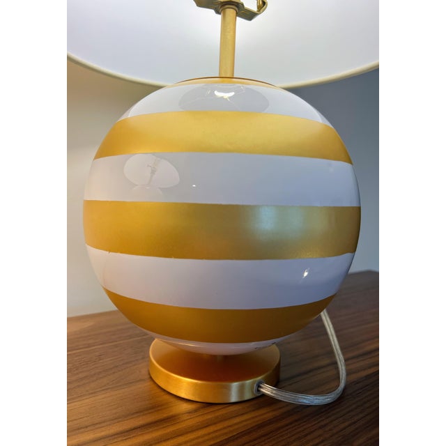 Contemporary Kate Spade New York Round Gold and White Striped Lamps - A ...