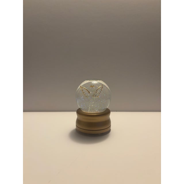 Glass Snow Globe With Gold Angel Figure on a Wooden Base | Chairish
