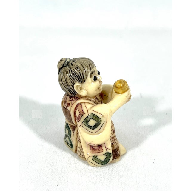 Chinese Netsuke - the Peach Seller and the Golden Ingot Bearer, a Pair ...