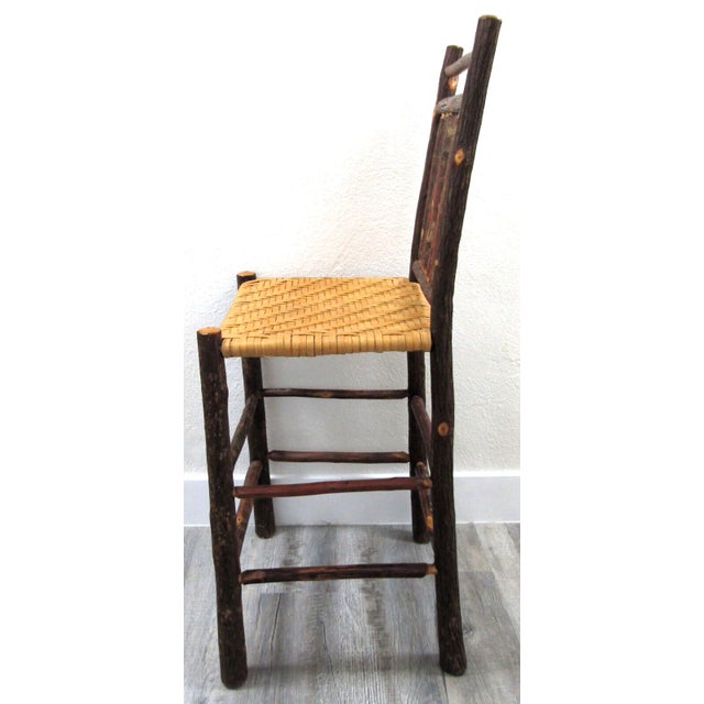 1950s Primitive Wood With Cane Woven Seat Counter Stool | Chairish