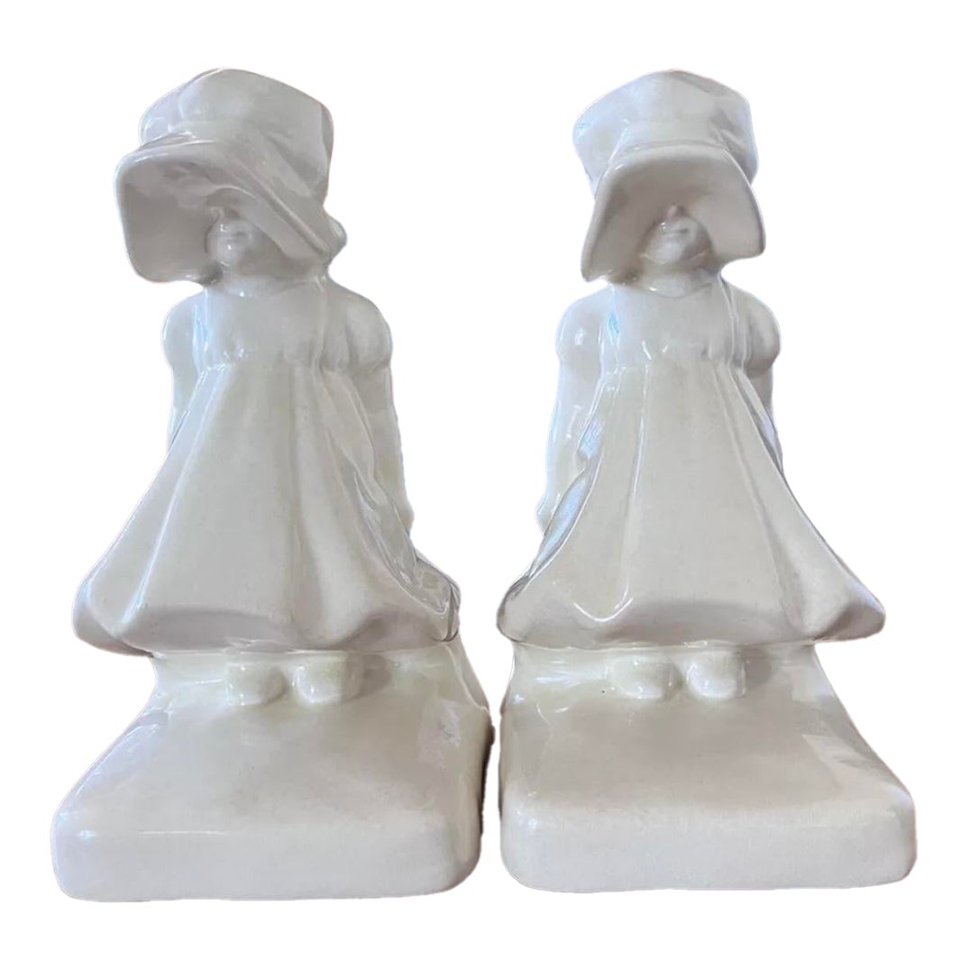 Pair of 1929 Cowan Art Pottery Bonnet Girl Bookends #521 | Chairish