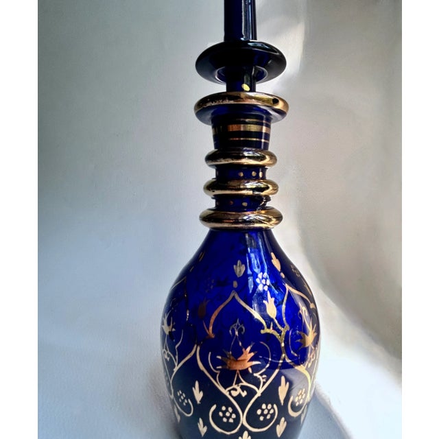 Mid 20th Century Gilt Decorated Bohemian Cobalt Blue Glass Decanter And 4 Stemmed Ruby Glasses Set