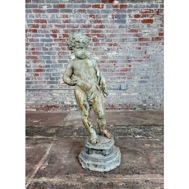 18th Century Italian Putti Outdoor Iron Sculpture | Chairish