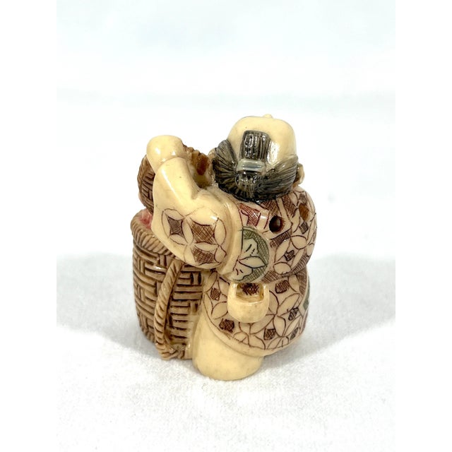 Chinese Netsuke - the Peach Seller and the Golden Ingot Bearer, a Pair ...