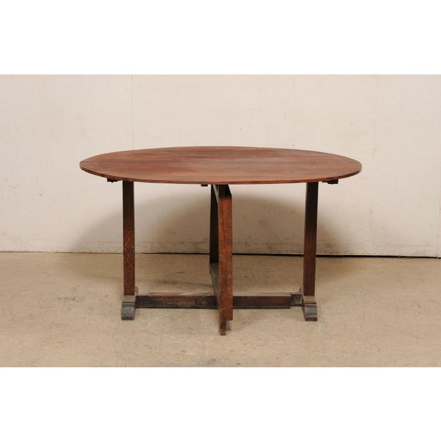 Early 20th Century Antique French Vintner's Table, Oval-Shaped | Chairish